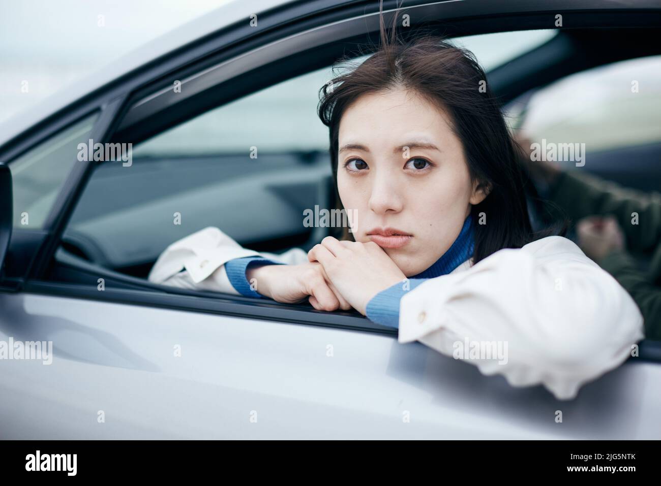 Japanese couple having a drive together Stock Photo - Alamy