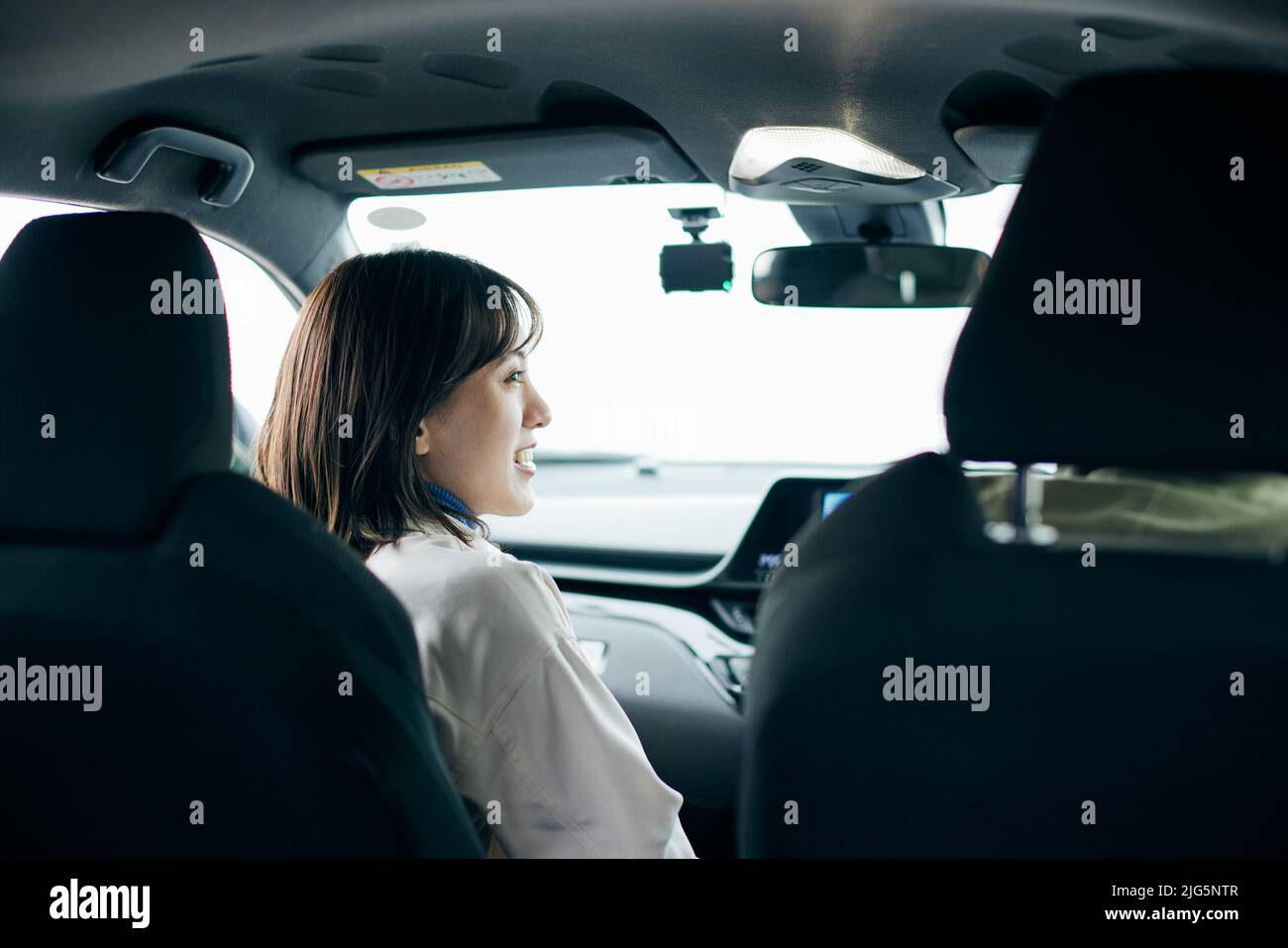 Japanese couple having a drive together Stock Photo - Alamy