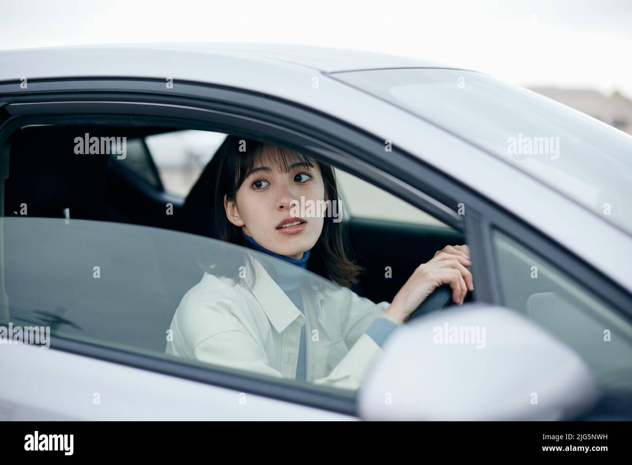 Japanese woman having a drive Stock Photo - Alamy