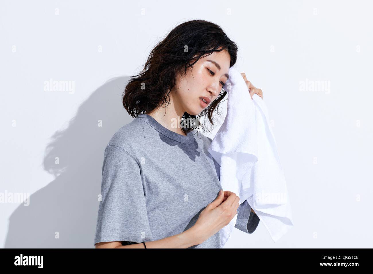 Sweat and hot Japanese woman Stock Photo - Alamy