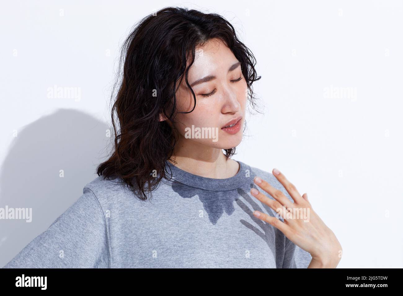 Sweat and hot Japanese woman Stock Photo - Alamy