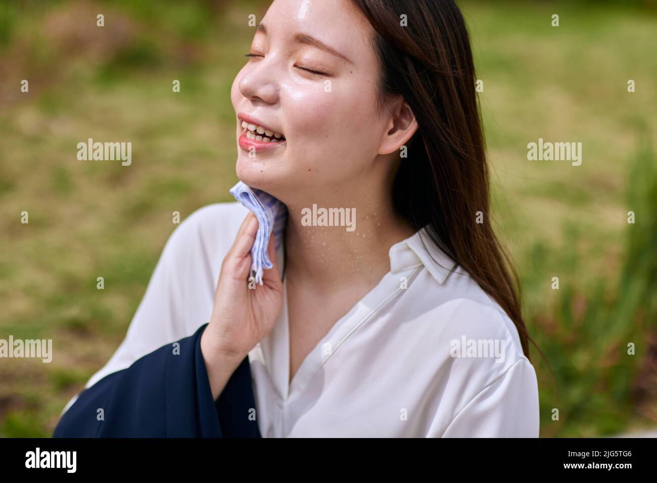 Sweat and hot Japanese woman Stock Photo - Alamy