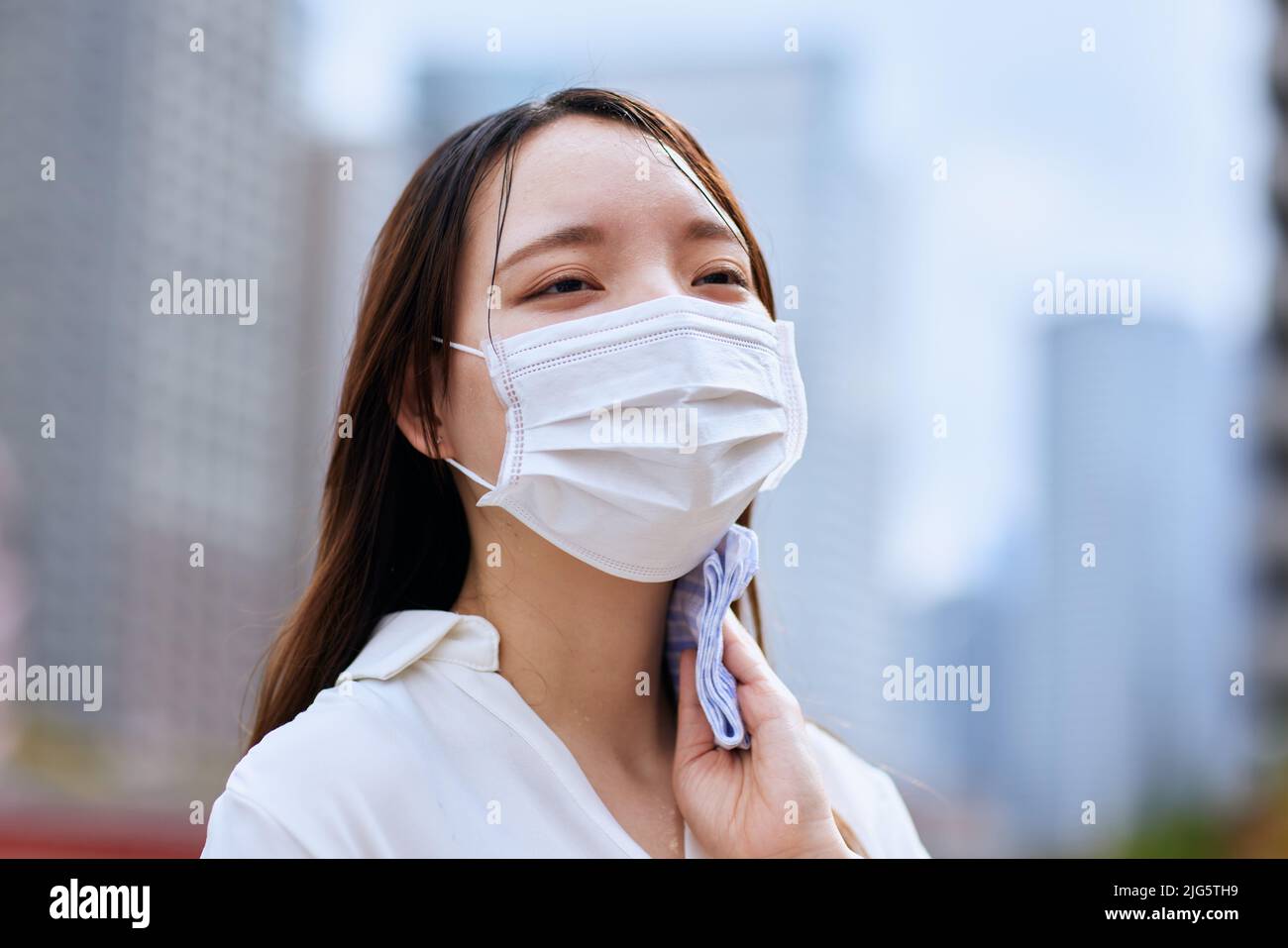 Sweat and hot Japanese woman Stock Photo - Alamy
