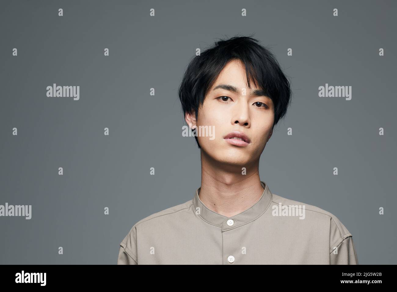 Japanese man studio portrait Stock Photo - Alamy
