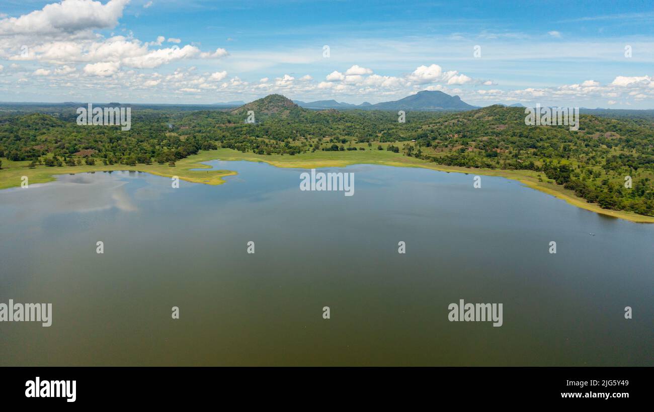 Aerial drone of tropical landscape with lake and valley with tropical ...
