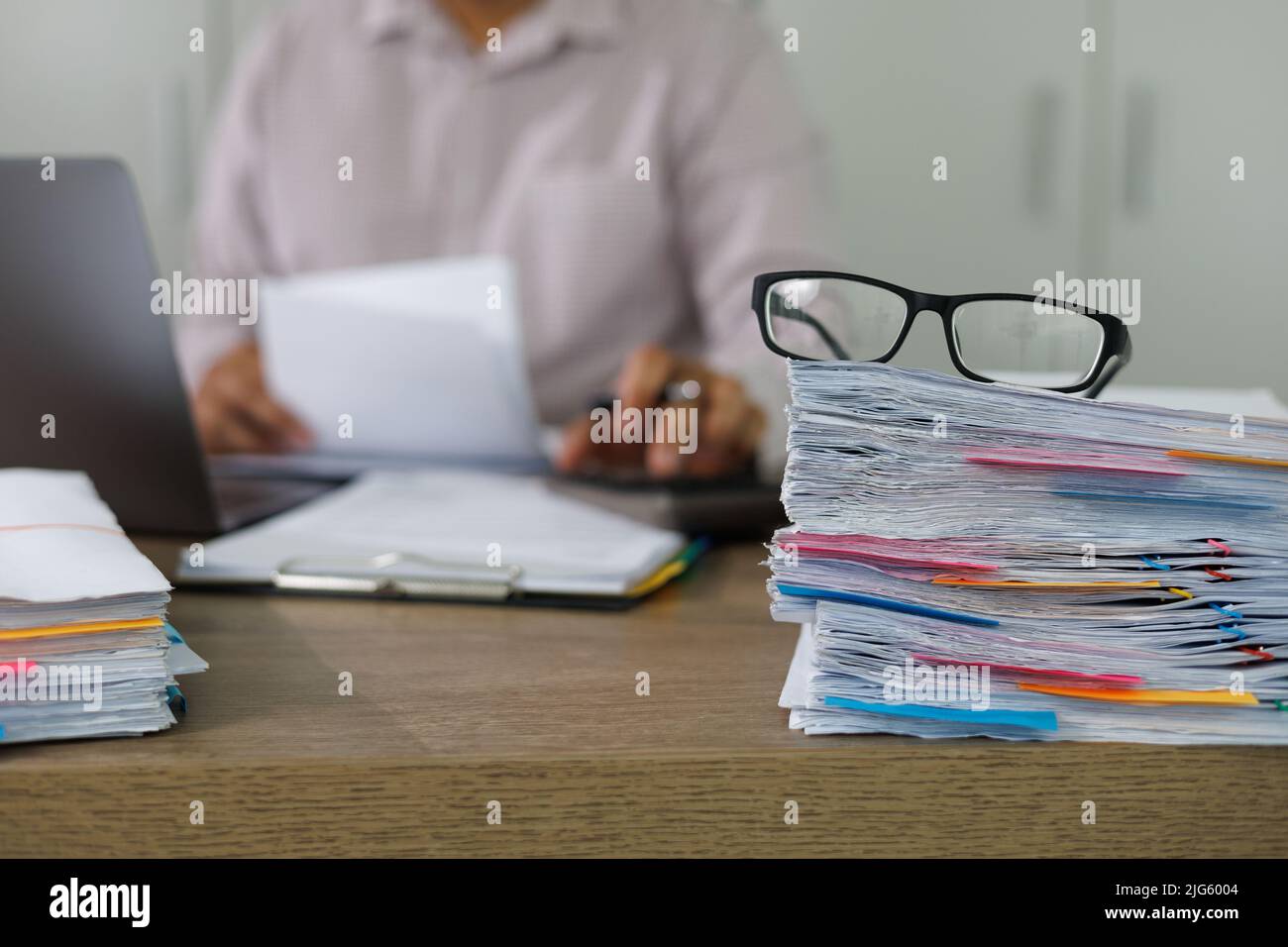 Business Documents concept document achieves on folders papers at busy ...