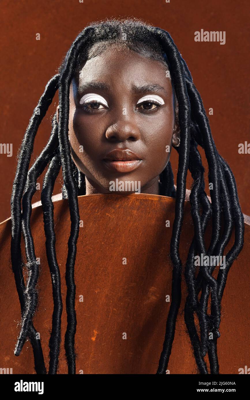 Modeling my heritage. Studio portrait of an attractive young woman ...