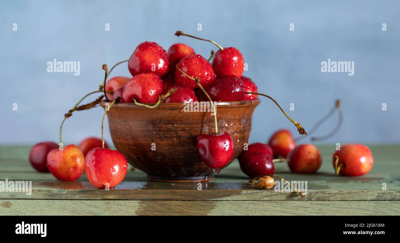 Still life with ripe and tasty cherries Stock Photo - Alamy