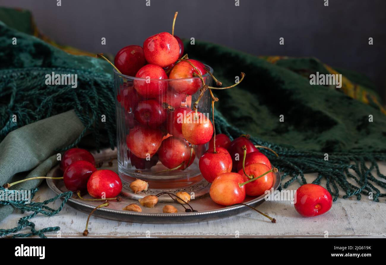 Still life with ripe and tasty cherries Stock Photo - Alamy