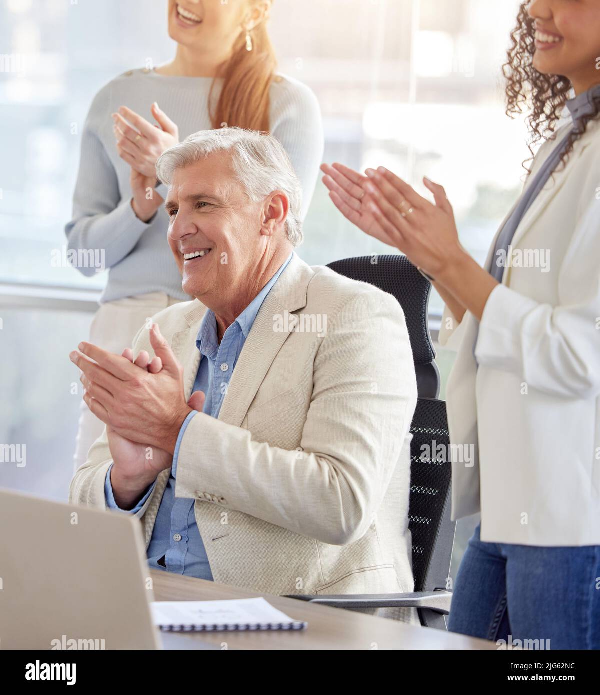 Leading my team to great success. Shot of a diverse group of ...