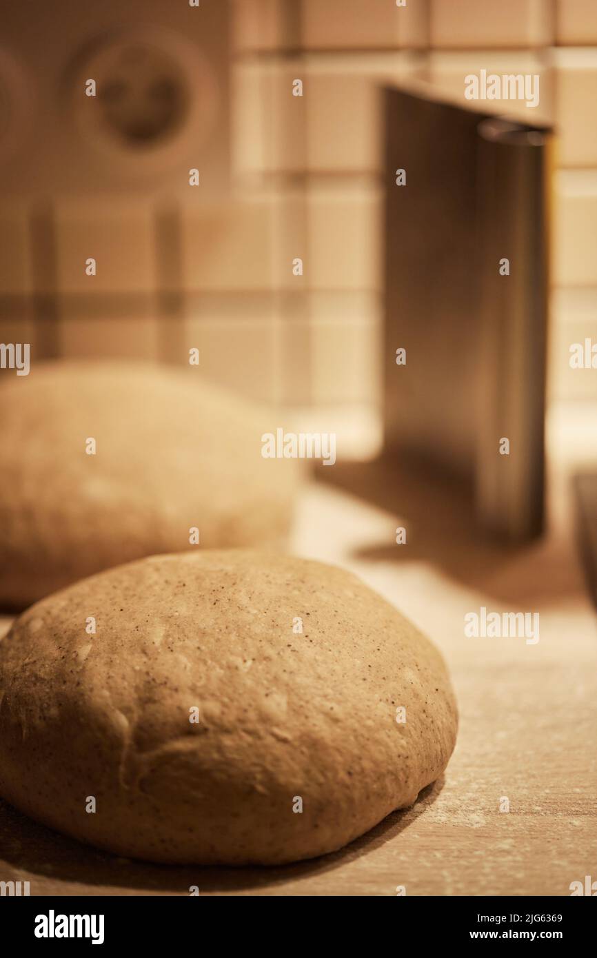 The process of making wheat bread at home. Dough shaping. The concept ...