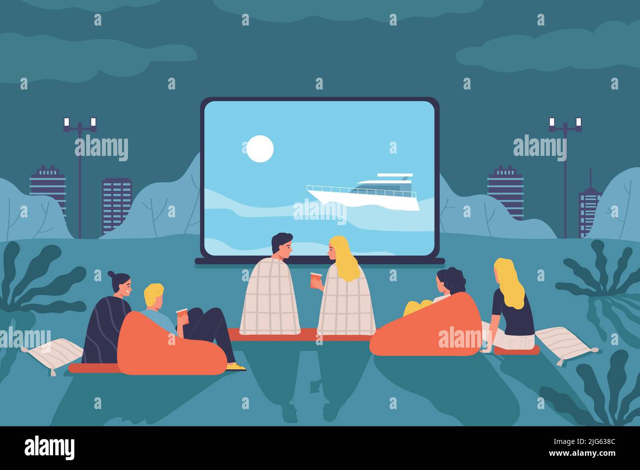 People sit on soft blankets and watch movies in an open air cinema flat ...