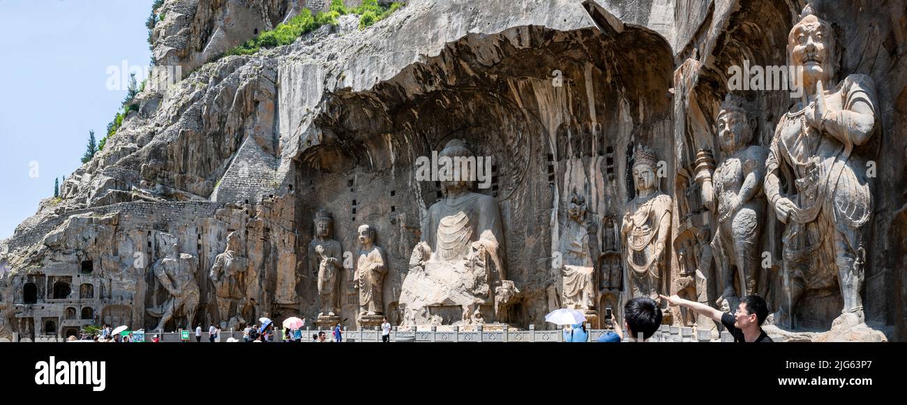 Carved statues of Longmen Grottoes (Longmen Caves). The complex was ...