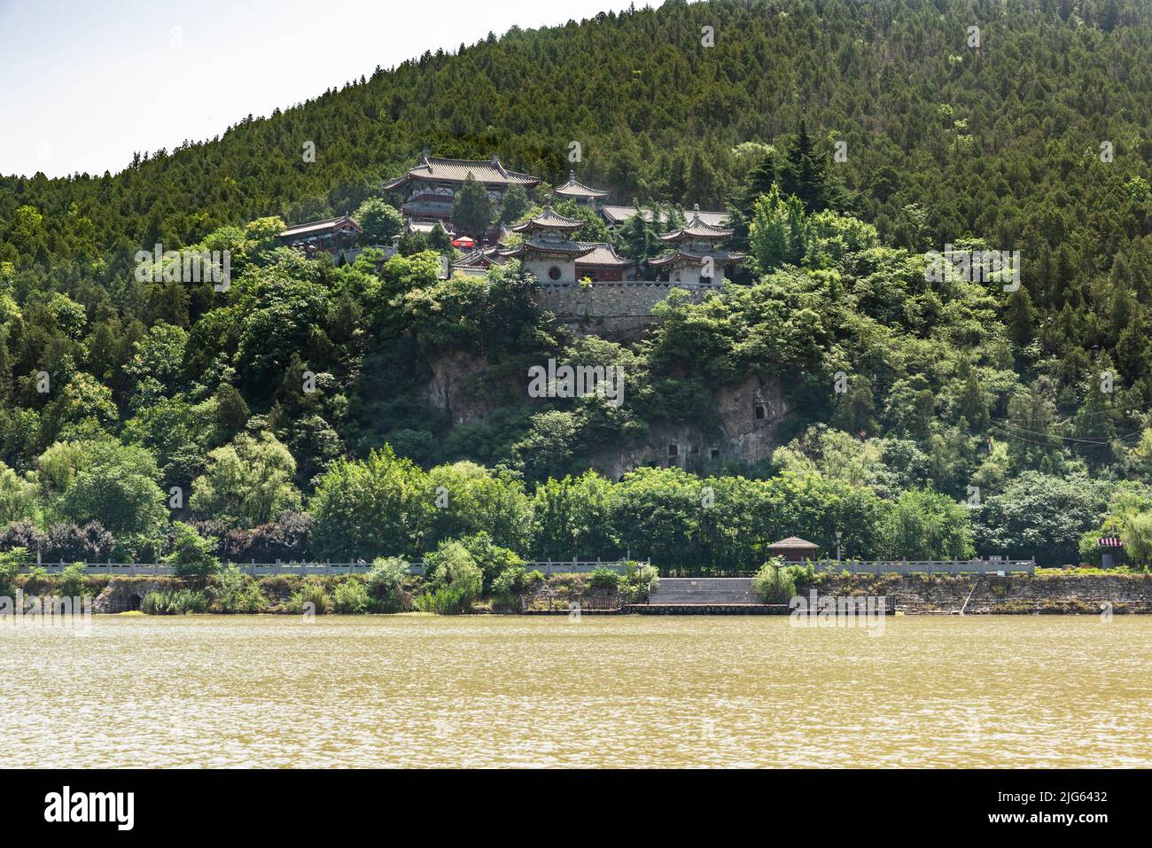 Carved statues of Longmen Grottoes (Longmen Caves). The complex was ...