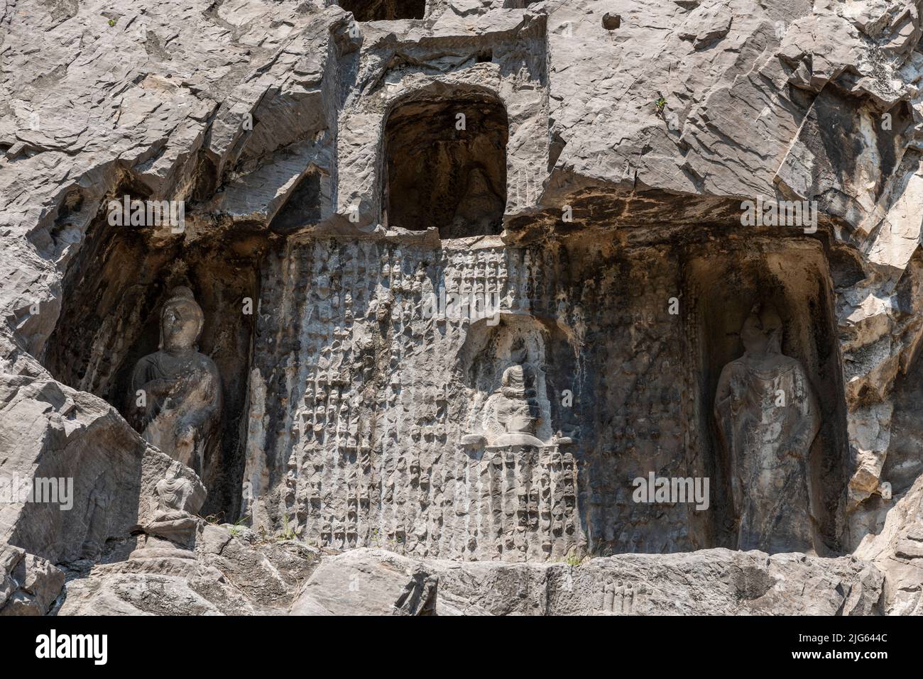 Carved statues of Longmen Grottoes (Longmen Caves). The complex was ...
