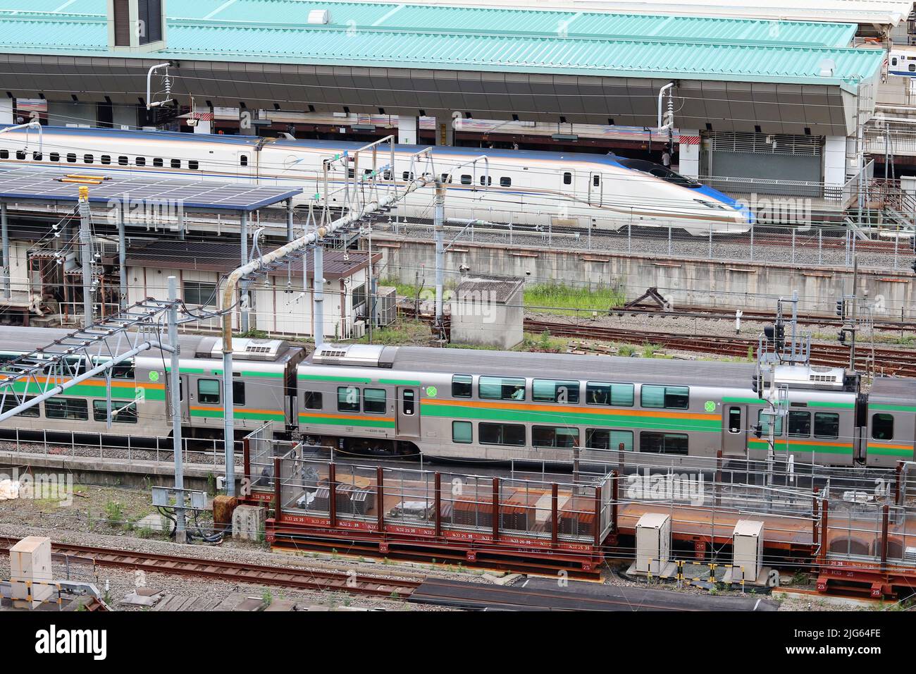TOKYO, JAPAN - July 7, 2022: Overhead view of a Tokaido Main Line train ...