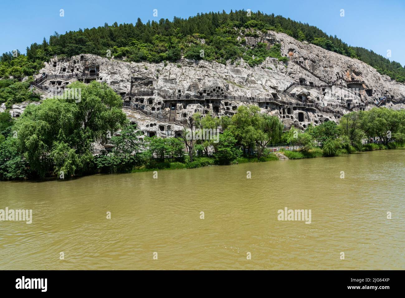 Carved statues of Longmen Grottoes (Longmen Caves). The complex was ...