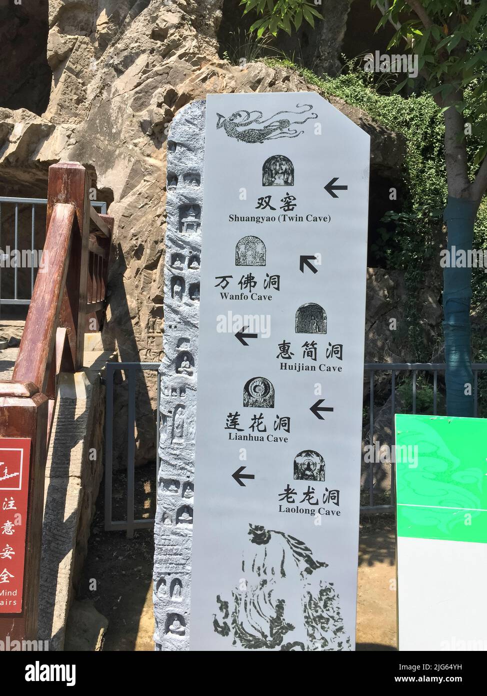 Carved statues of Longmen Grottoes (Longmen Caves). The complex was ...