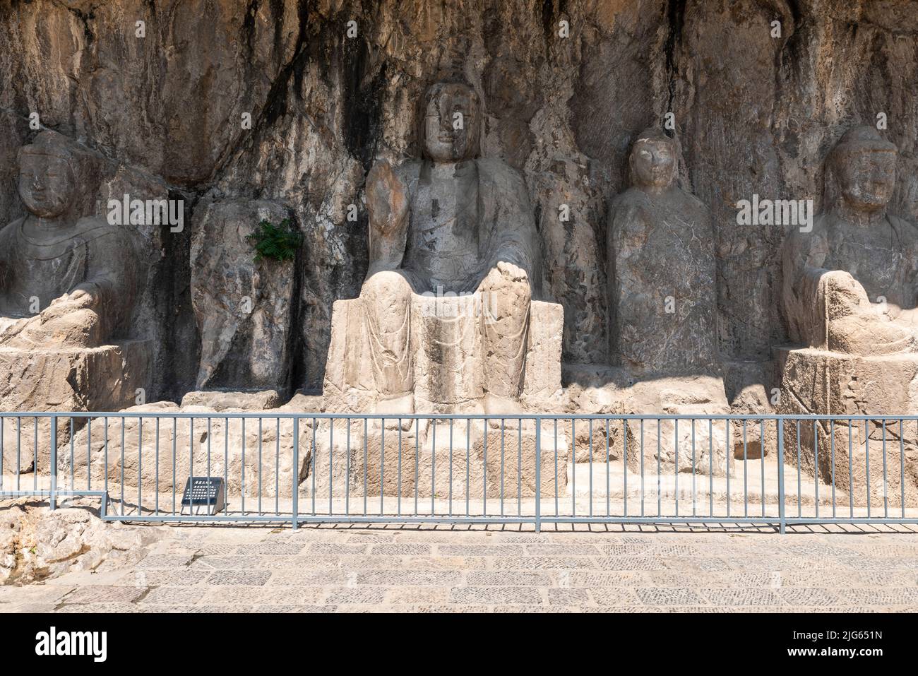 Carved statues of Longmen Grottoes (Longmen Caves). The complex was ...