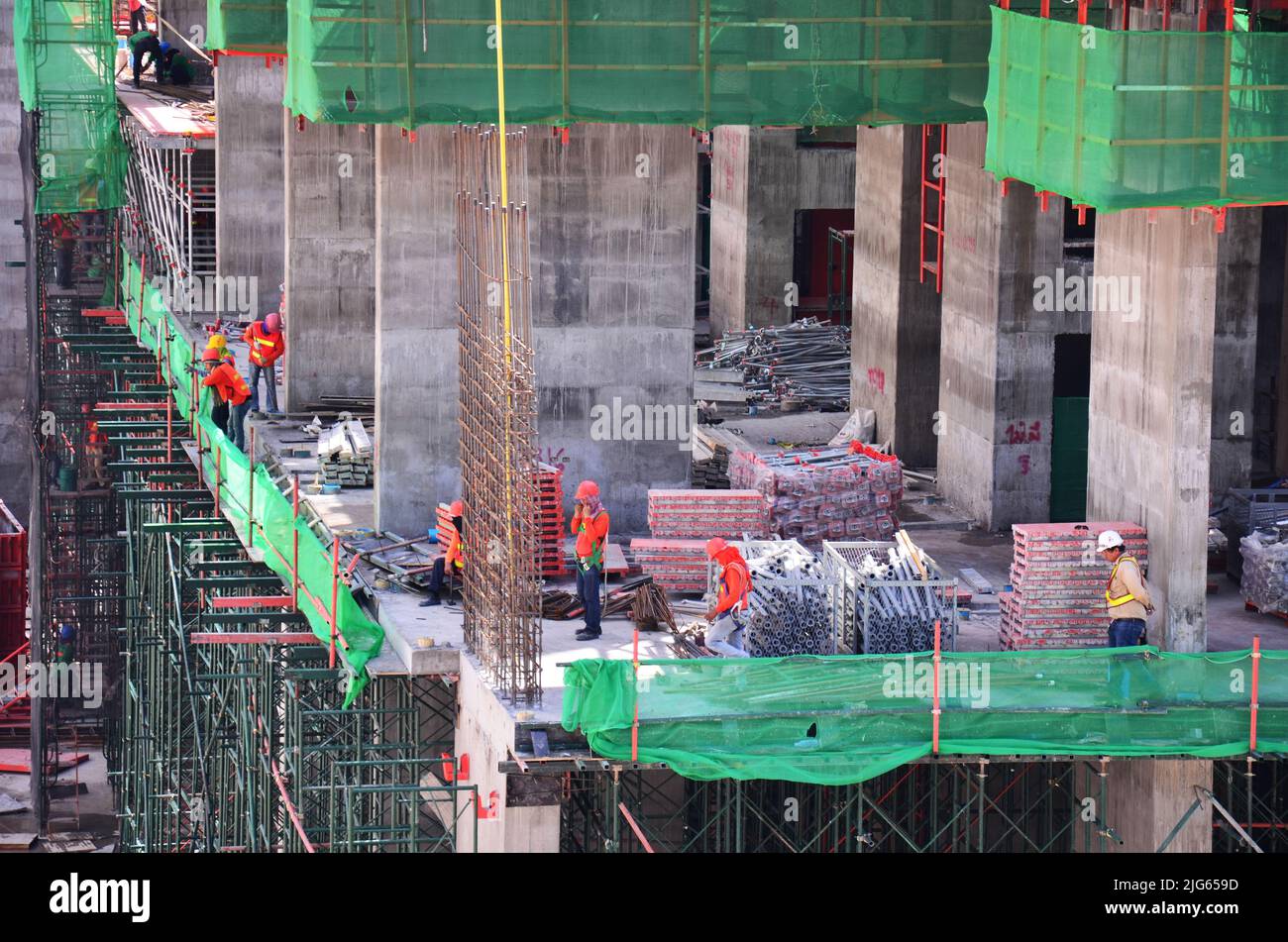 Asian labor people and thai labour workers use machine and heavy ...