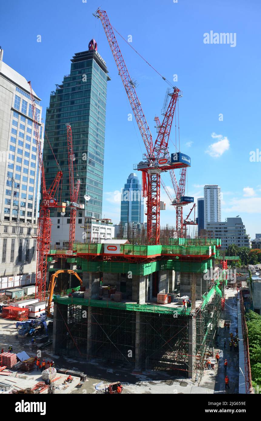 Asian labor people and thai labour workers builder use machine and ...
