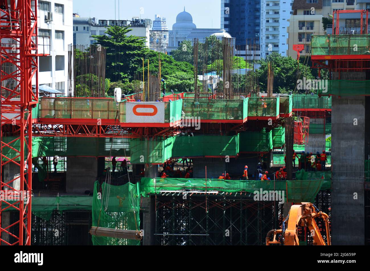 Asian labor people and thai labour workers use machine and heavy ...