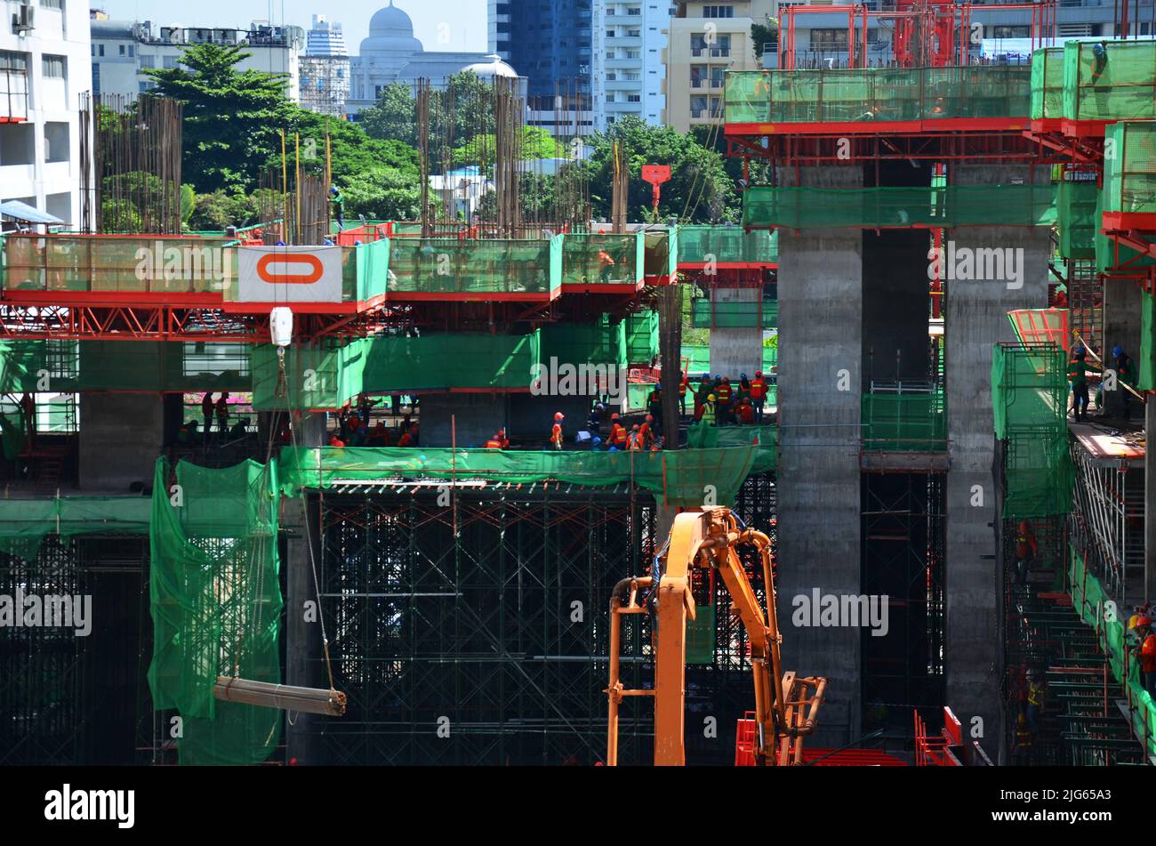 Asian labor people and thai labour workers use machine and heavy ...