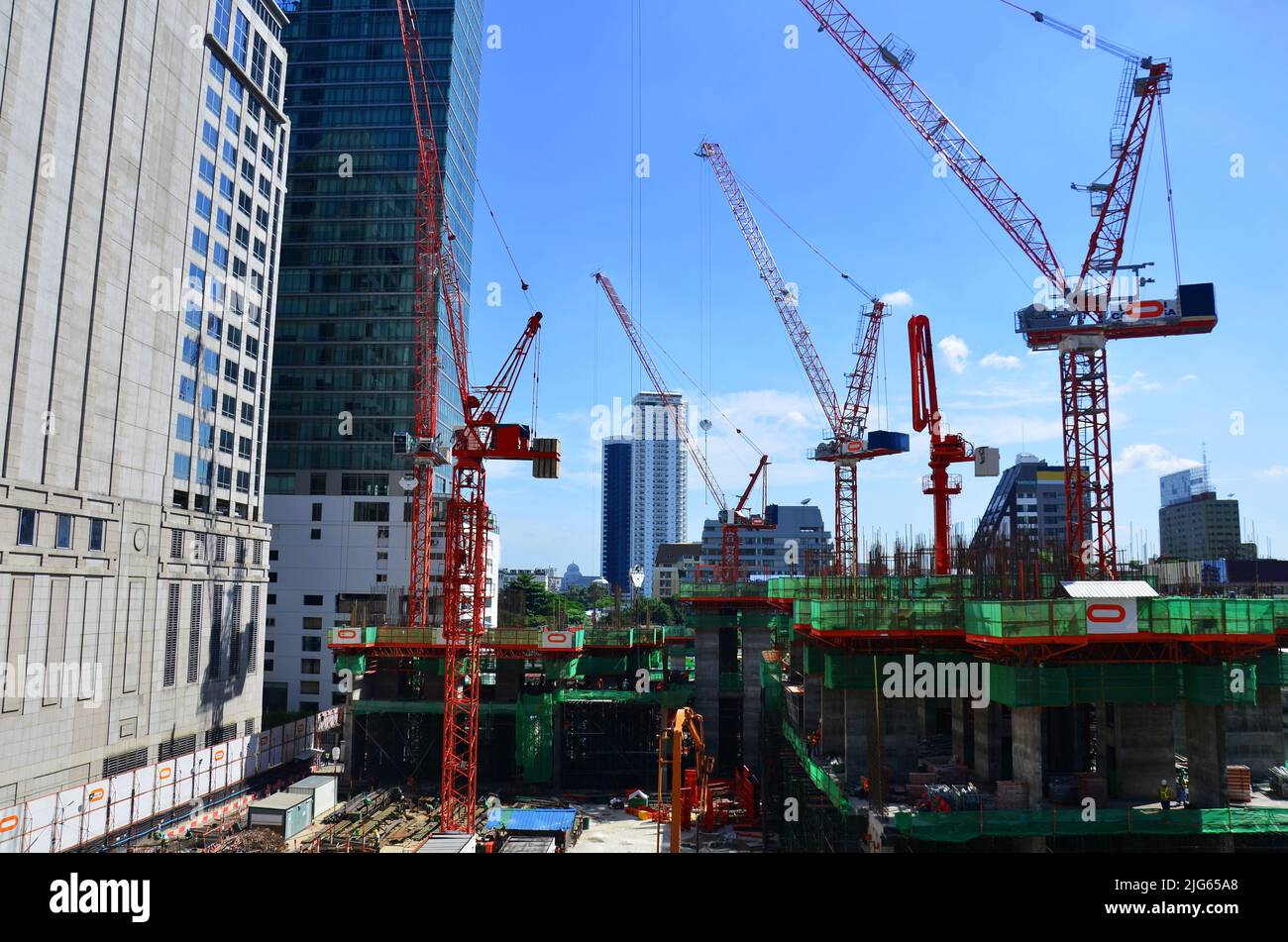 Asian labor people and thai labour workers use machine and heavy ...