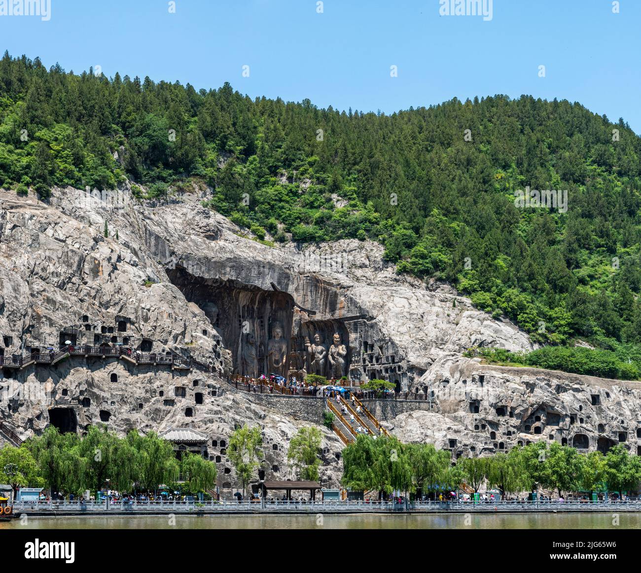 Carved statues of Longmen Grottoes (Longmen Caves). The complex was ...