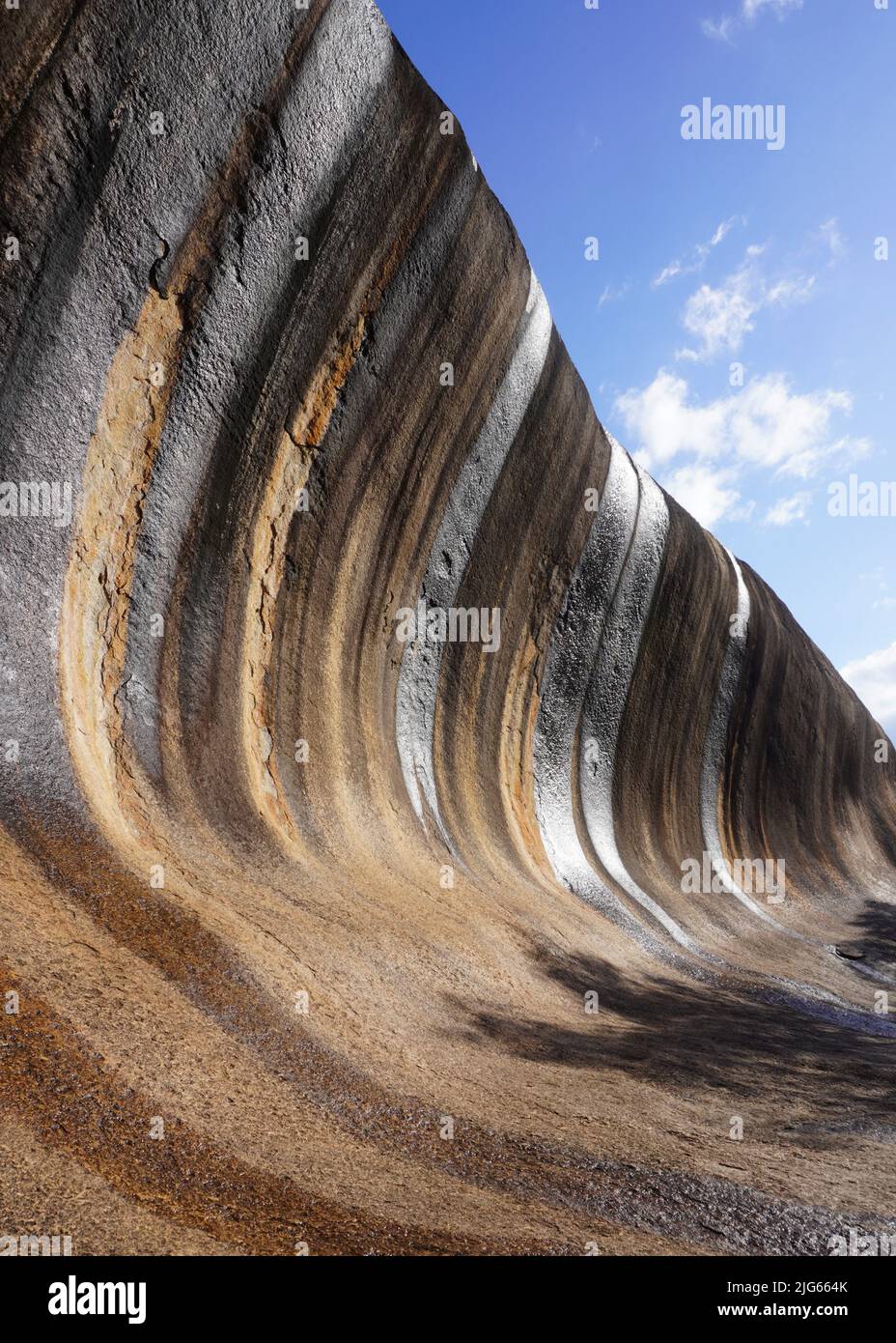 Sun illuminating golden and silver Stripes on Wave Rock Stock Photo - Alamy