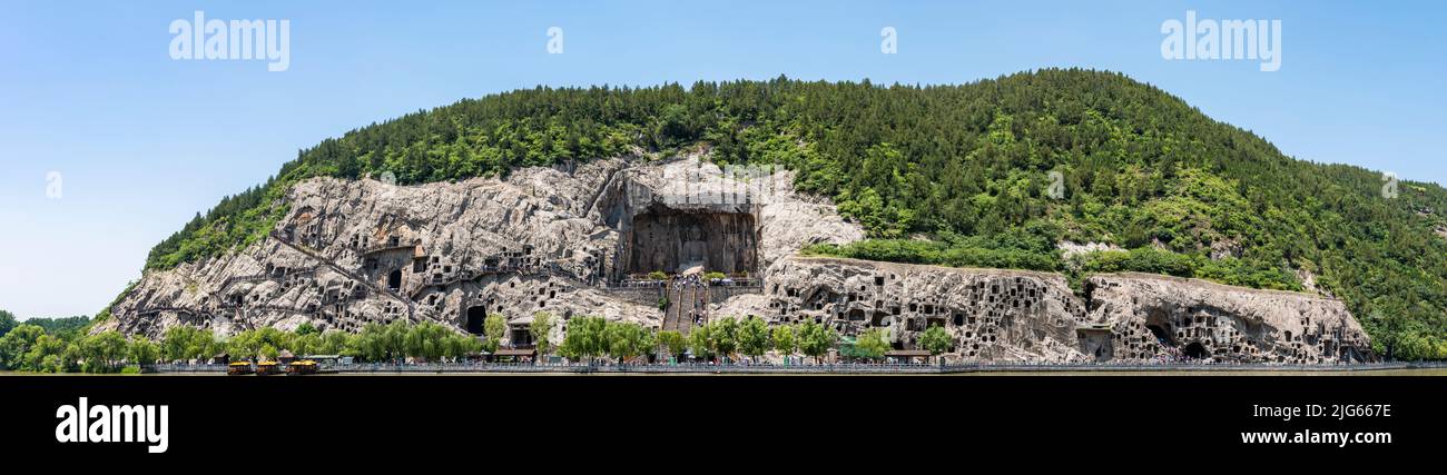 Panorama view of the carved statues of Longmen Grottoes (Longmen Caves ...