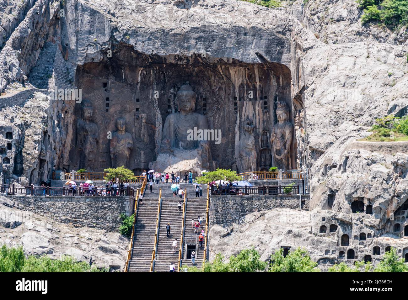 Carved statues of Longmen Grottoes (Longmen Caves). The complex was ...