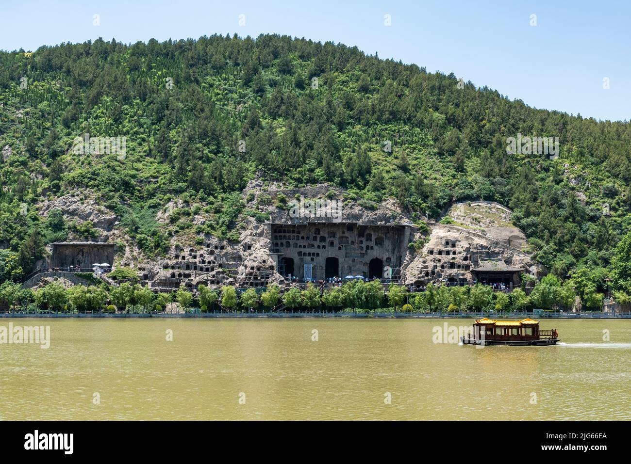 Carved statues of Longmen Grottoes (Longmen Caves). The complex was ...