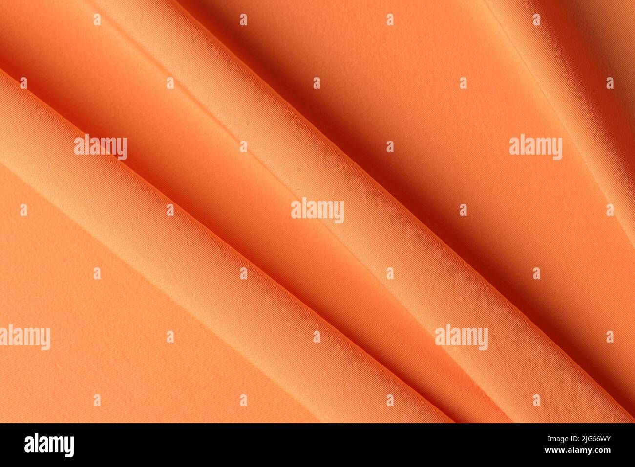 Bright orange silk cotton fabric texture background Stock Photo - Alamy