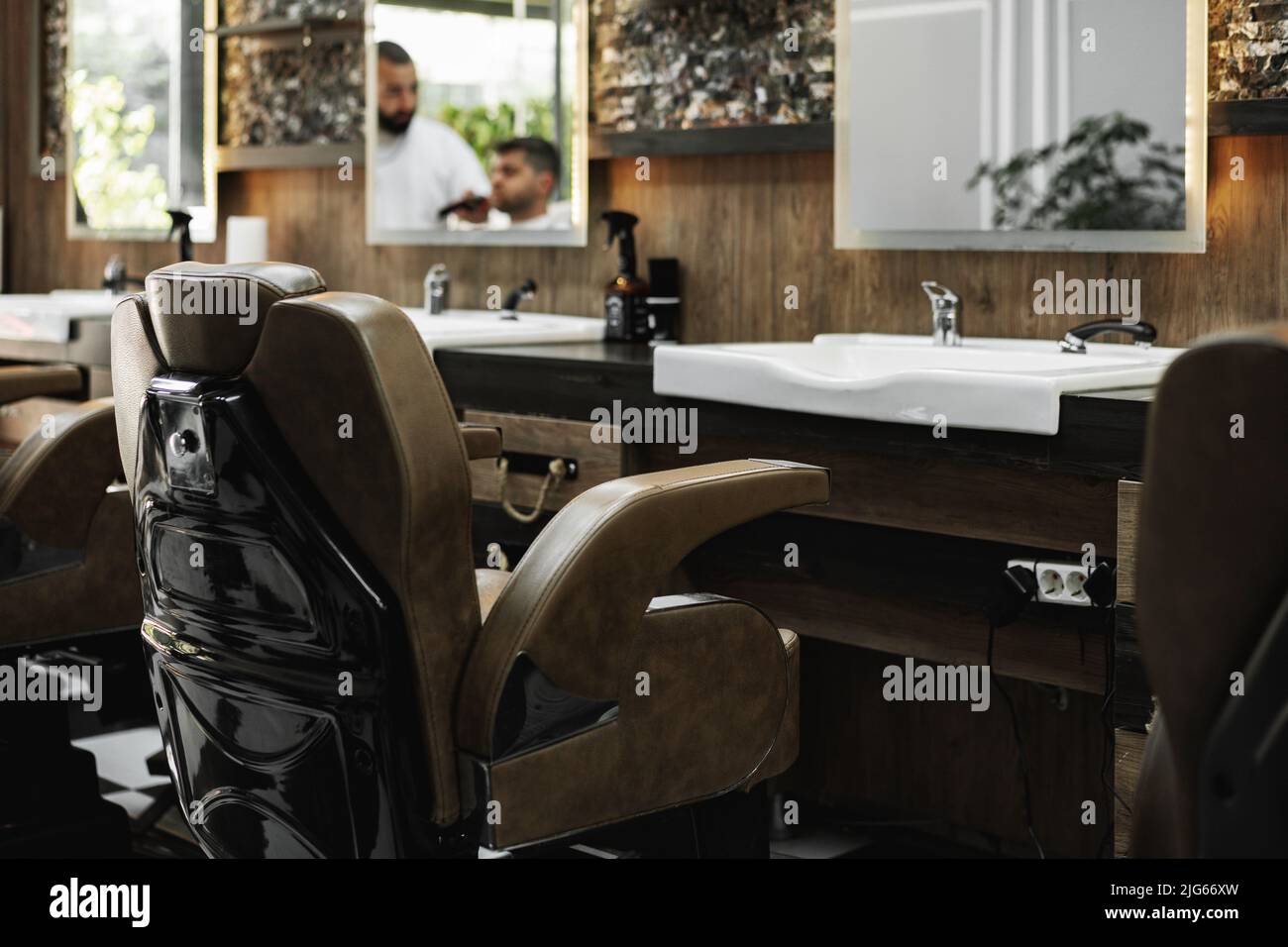 Modern empty barbershop interior with chairs and mirrors Stock Photo ...