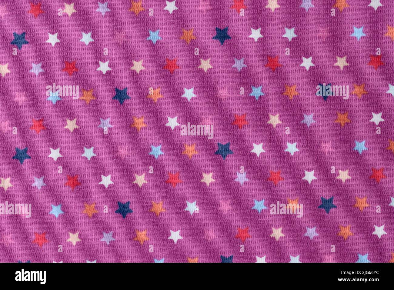 Pink smooth fabric with colourful stars texture background Stock Photo ...