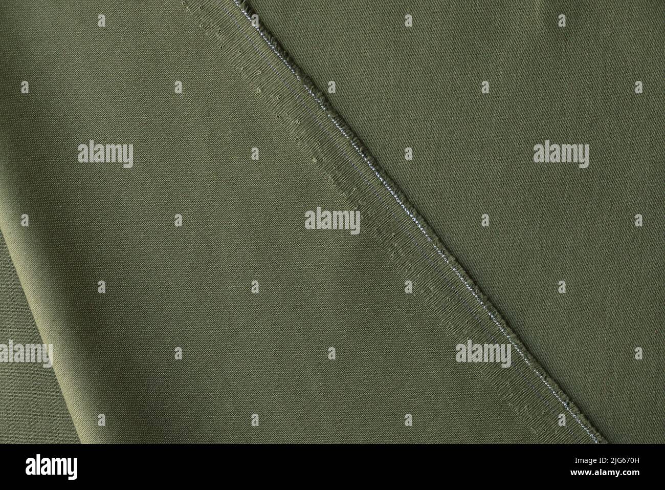 Sample khaki fabric with front and back side for fabrics catalogue ...