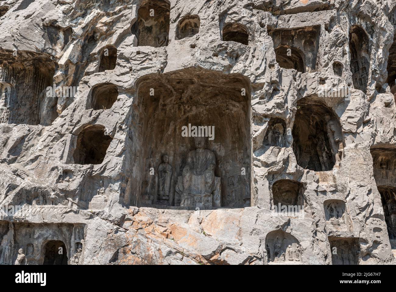 Carved statues of Longmen Grottoes (Longmen Caves). The complex was ...