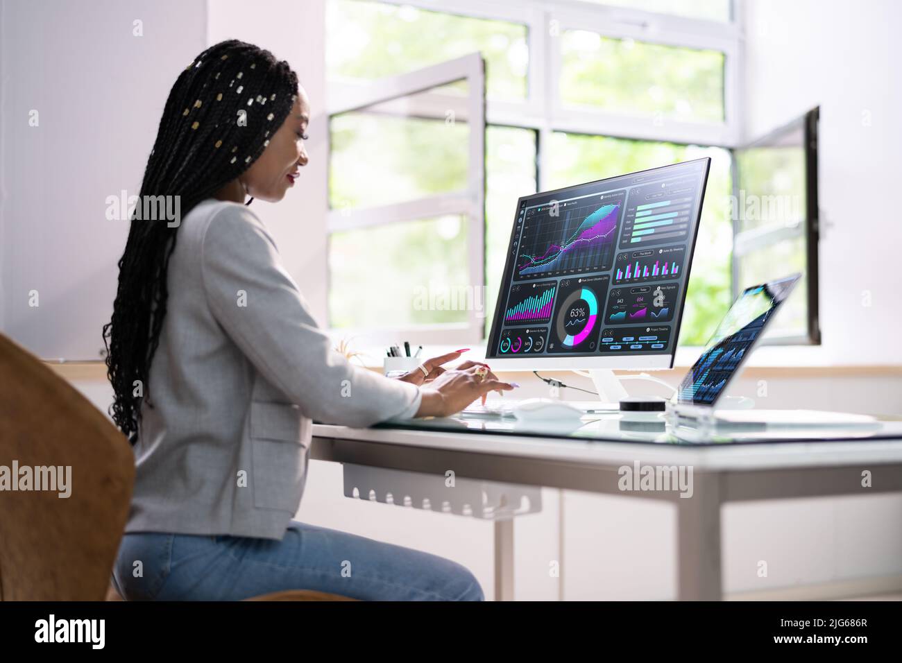 African American Business Data Analyst Woman Using Computer Stock Photo ...