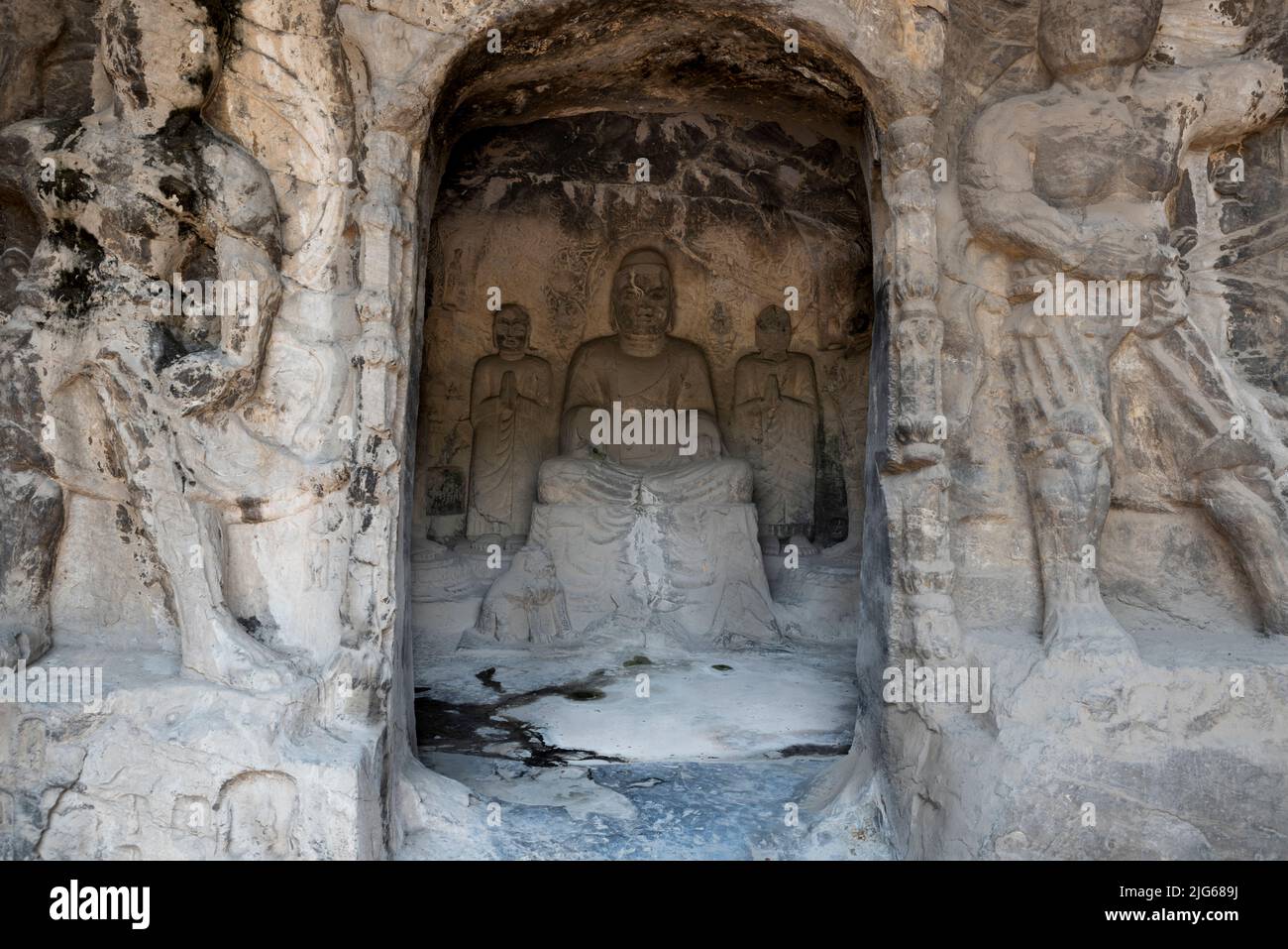 Carved statues of Longmen Grottoes (Longmen Caves). The complex was ...