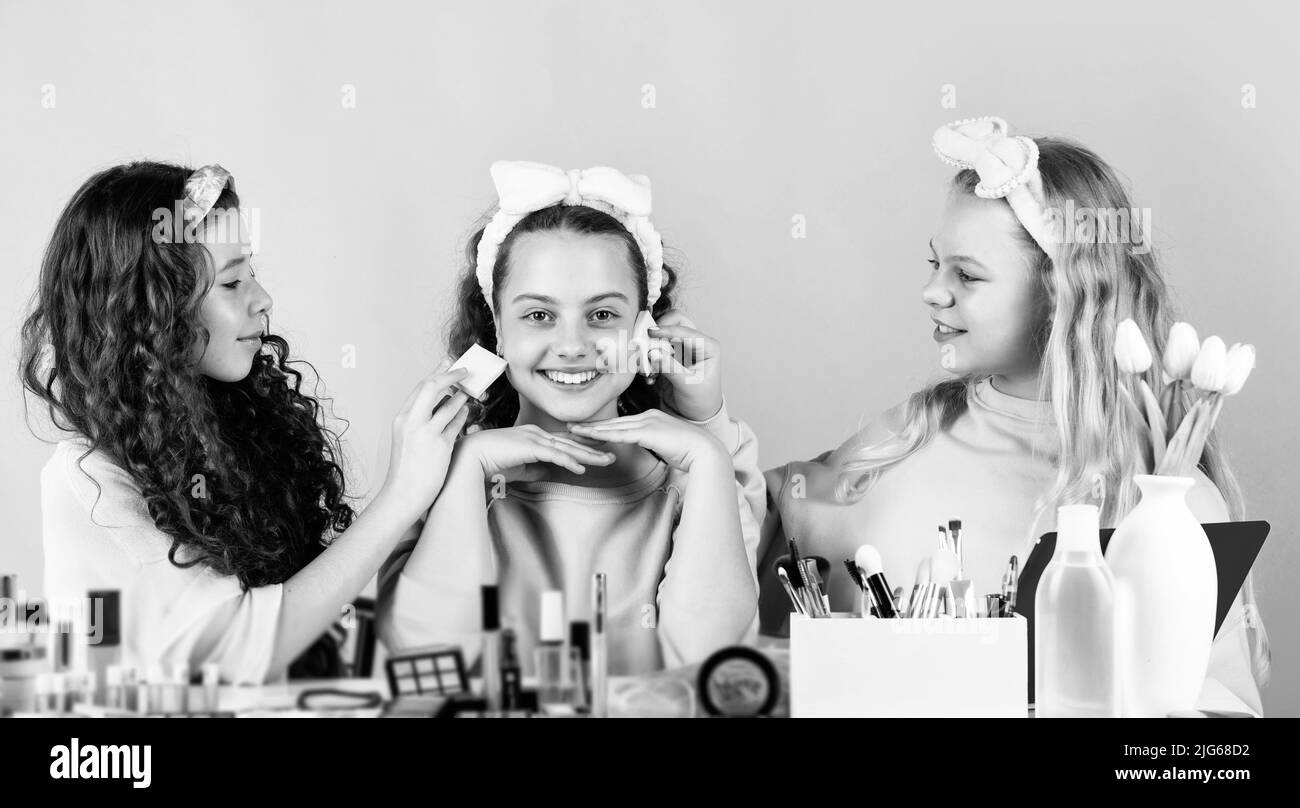 Best friends. Cleanse carefully. Beauty and fashion. Girls doing makeup ...