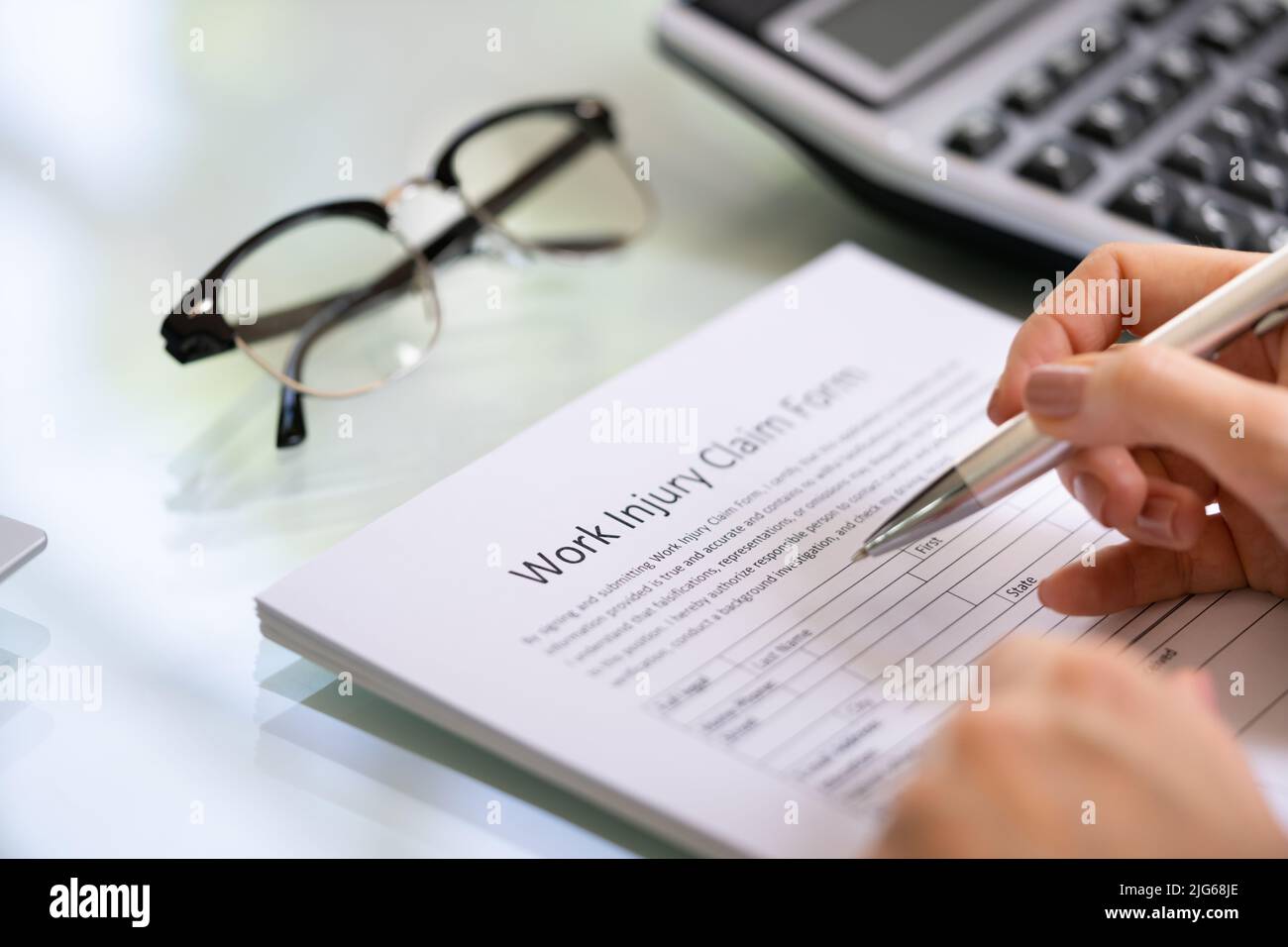 Filling Worker Compensation After Injury Application Form Stock Photo ...
