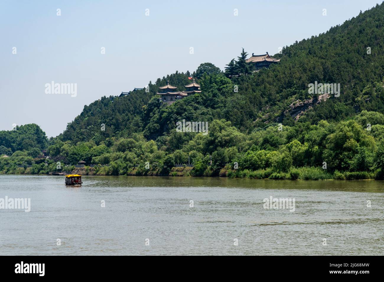 Carved statues of Longmen Grottoes (Longmen Caves). The complex was ...