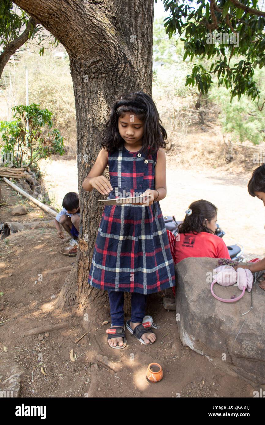 kids playing with soil, indian kids play Stock Photo - Alamy