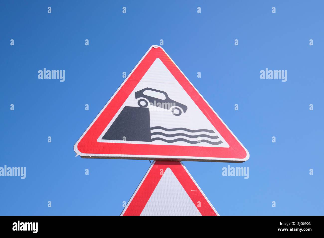 Close up, detail of the standard red and white triangle shaped metal ...