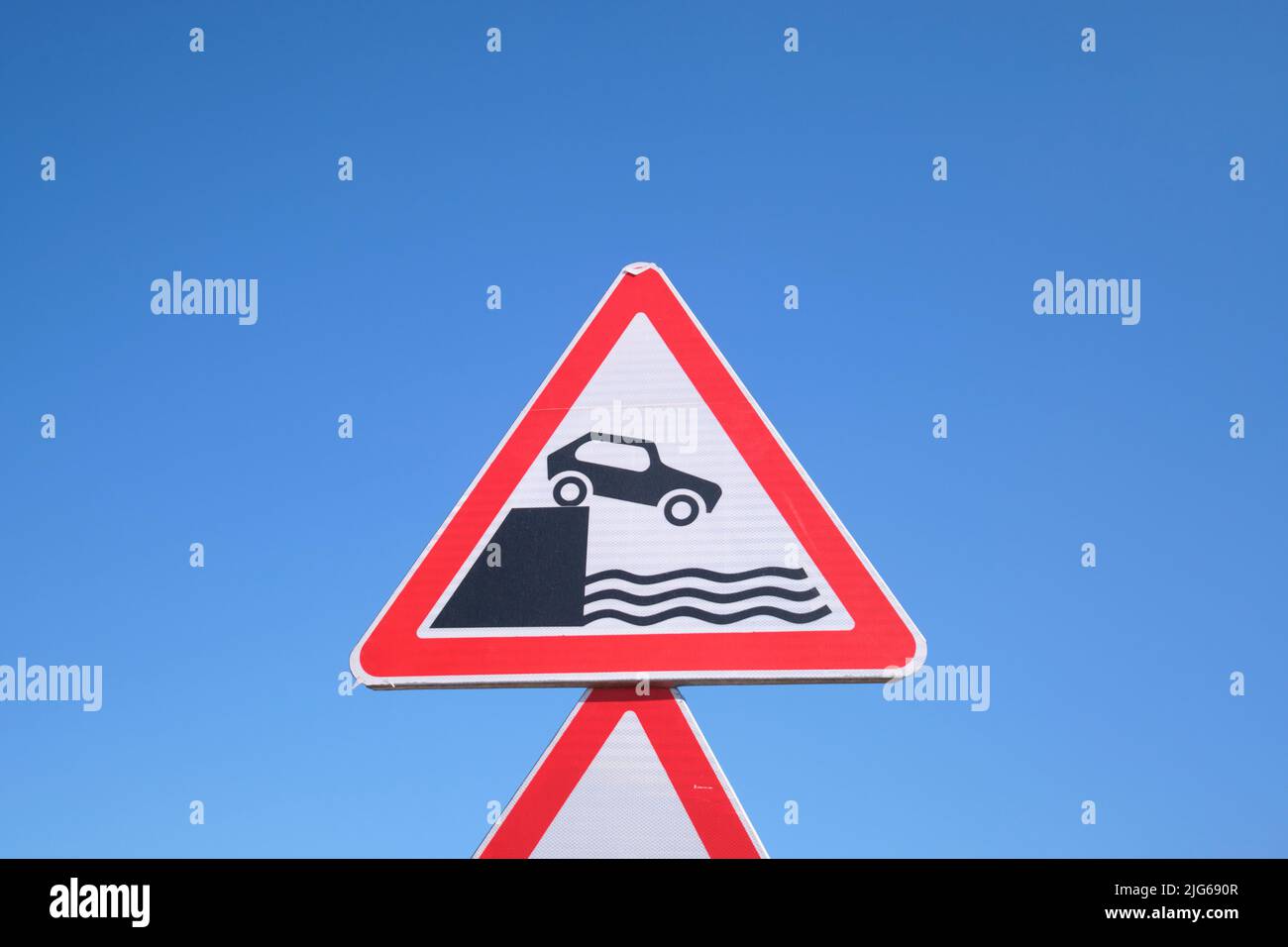 Close up, detail of the standard red and white triangle shaped metal ...