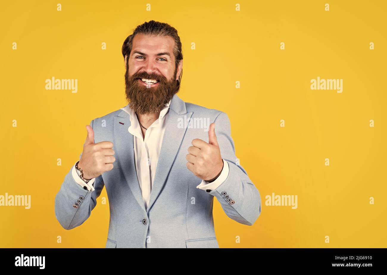 thumb up gesture. elegant businessman wear elegant apparel for formal ...