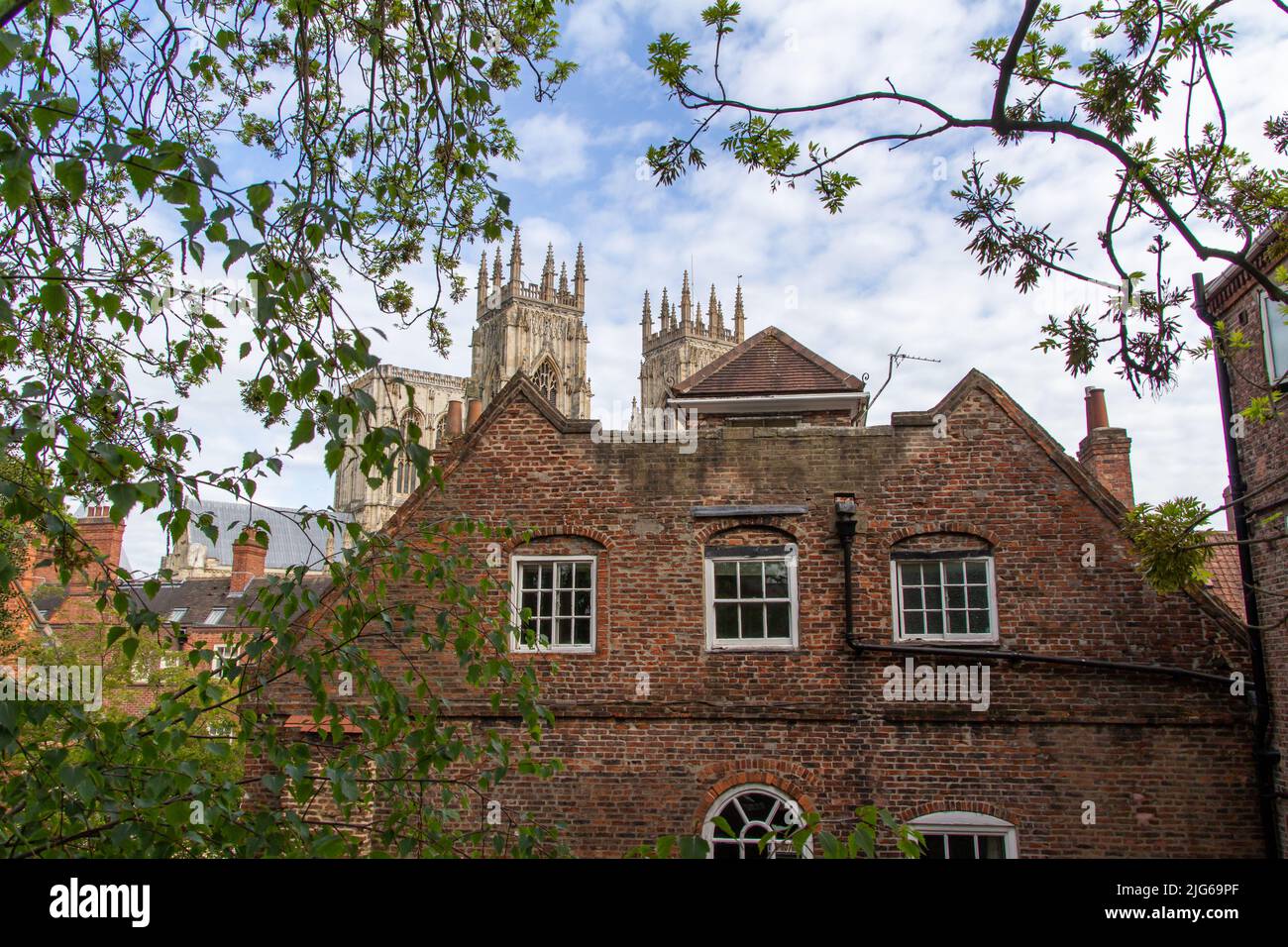 Cityscape view of York, England from atop the medieval city stone walls ...