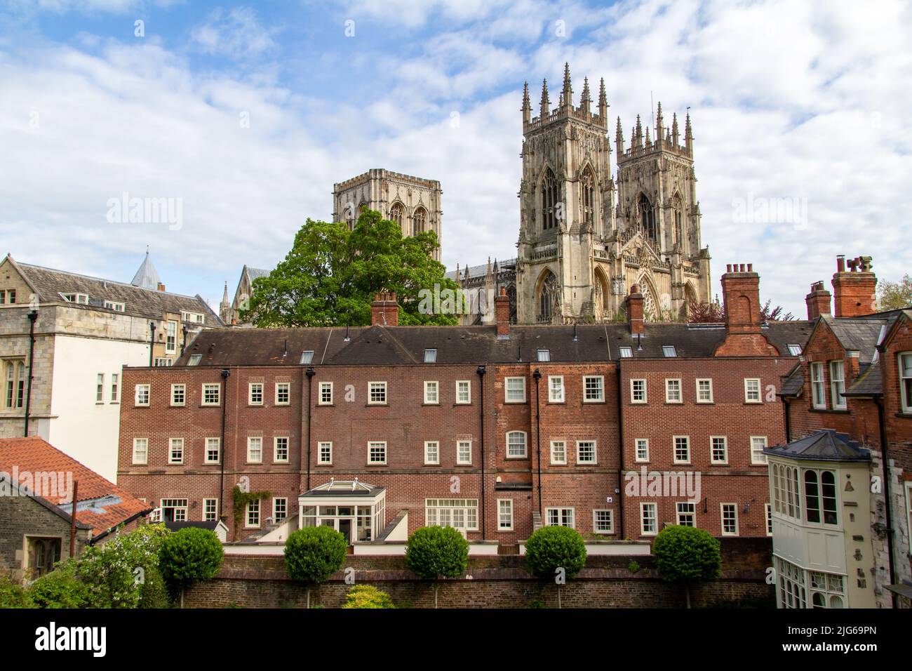 Cityscape view of York, England from atop the medieval city stone walls ...