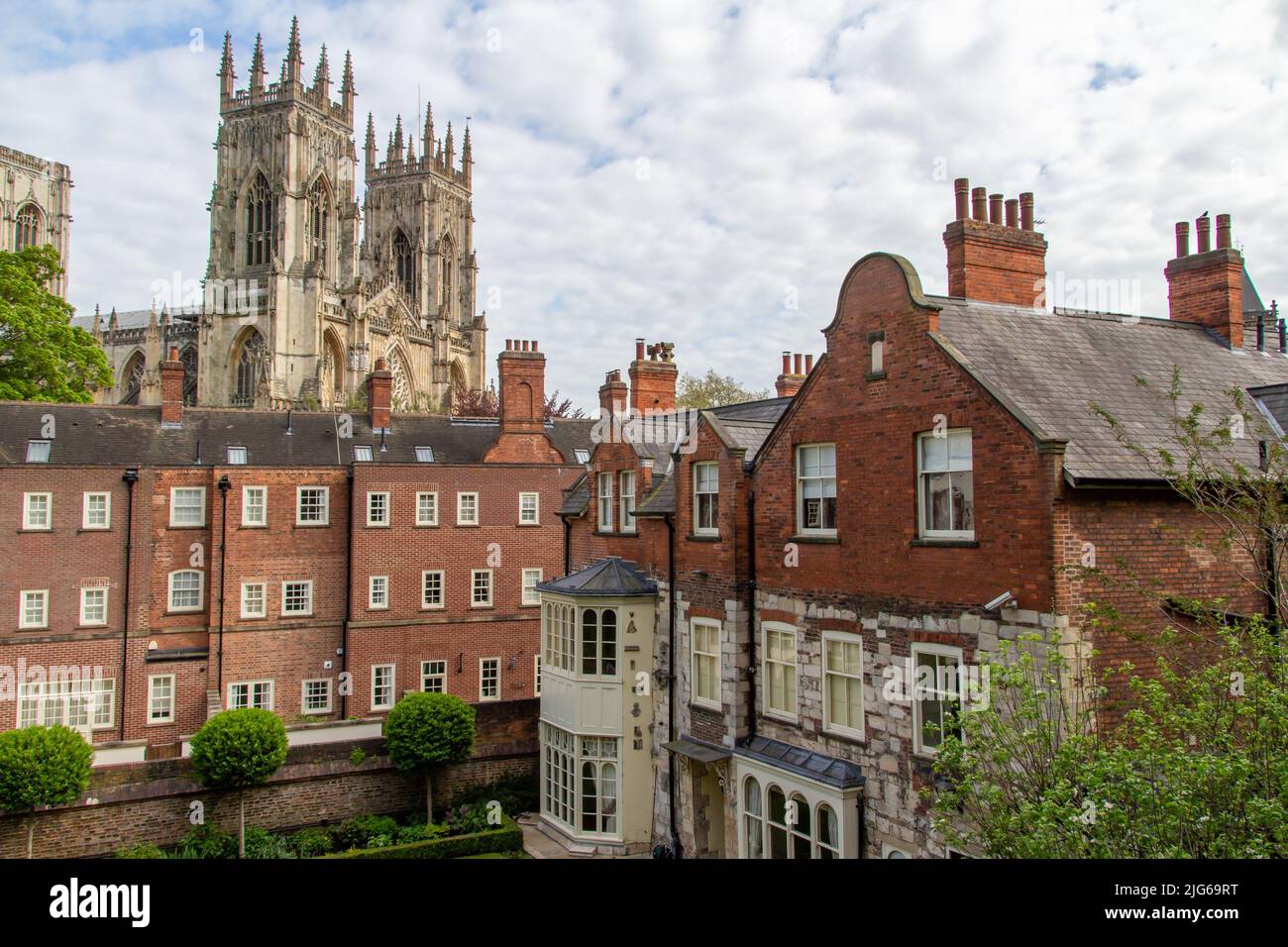 Cityscape view of York, England from atop the medieval city stone walls ...